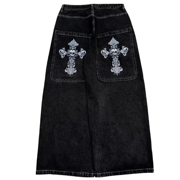 Loose straight-leg casual denim trousers with skull cross print ...